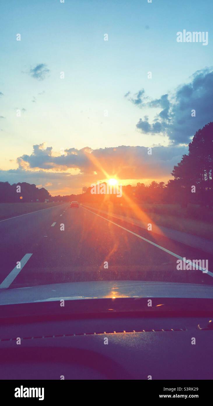 Southern sunset with sun rays in Florence, SC USA. Simply South ...