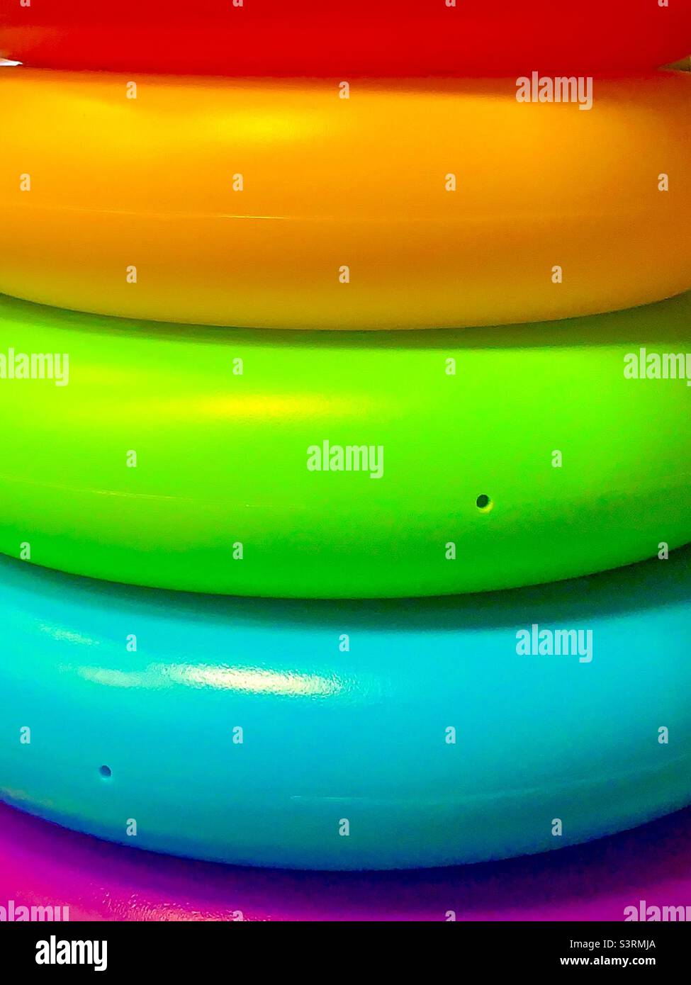 Rainbow Stacking Rings Stock Photo - Alamy