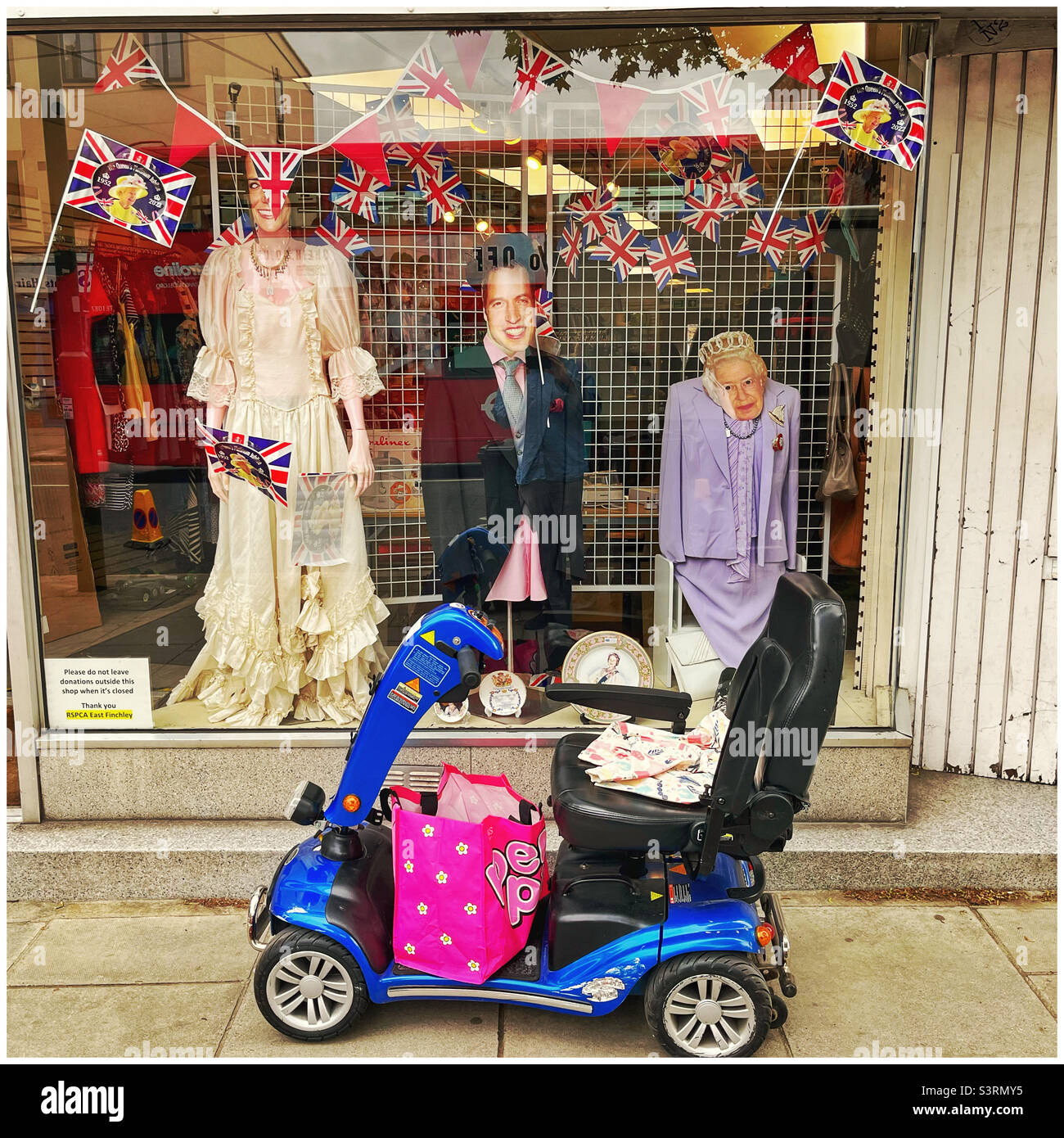 Mobility scooter in front of shop window decked out with Royal jubilee ...
