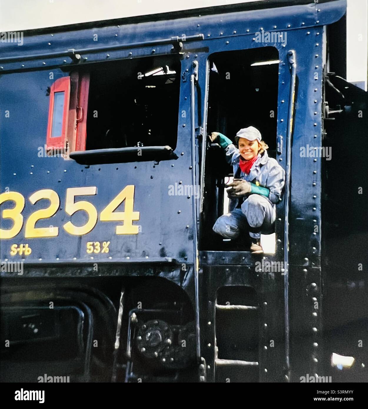 Woman train operator heritage railway Stock Photo - Alamy
