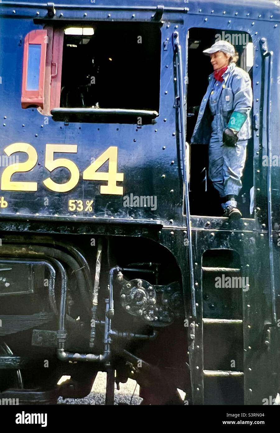 Woman train operator heritage railway Stock Photo - Alamy