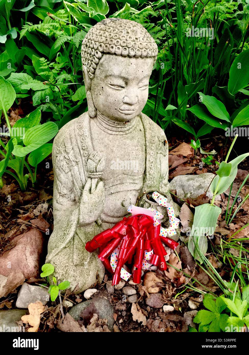 Seated Buddha in a park. A celebration. Tranquility personified. Icon ...