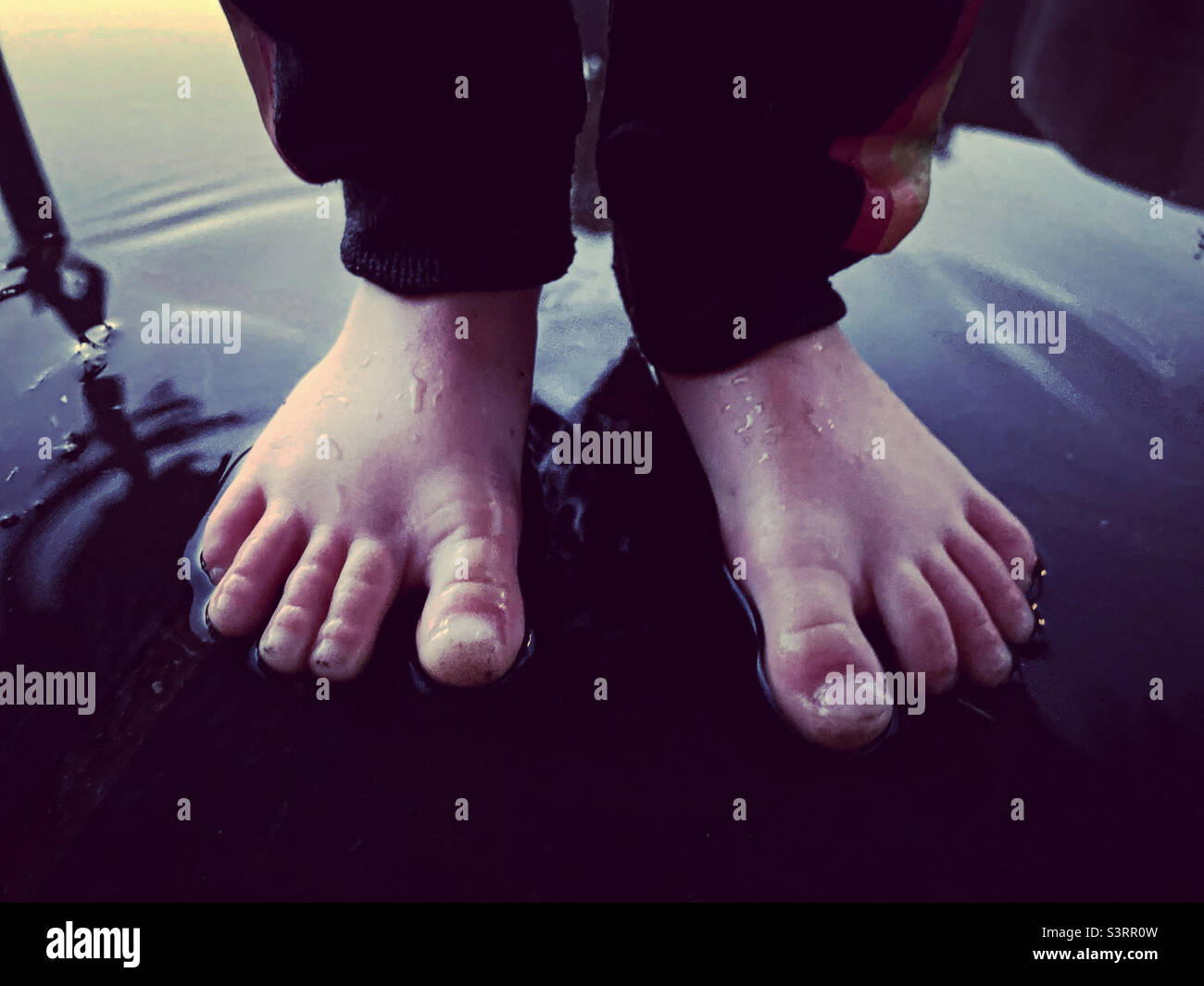 Feet in puddle hi-res stock photography and images - Alamy