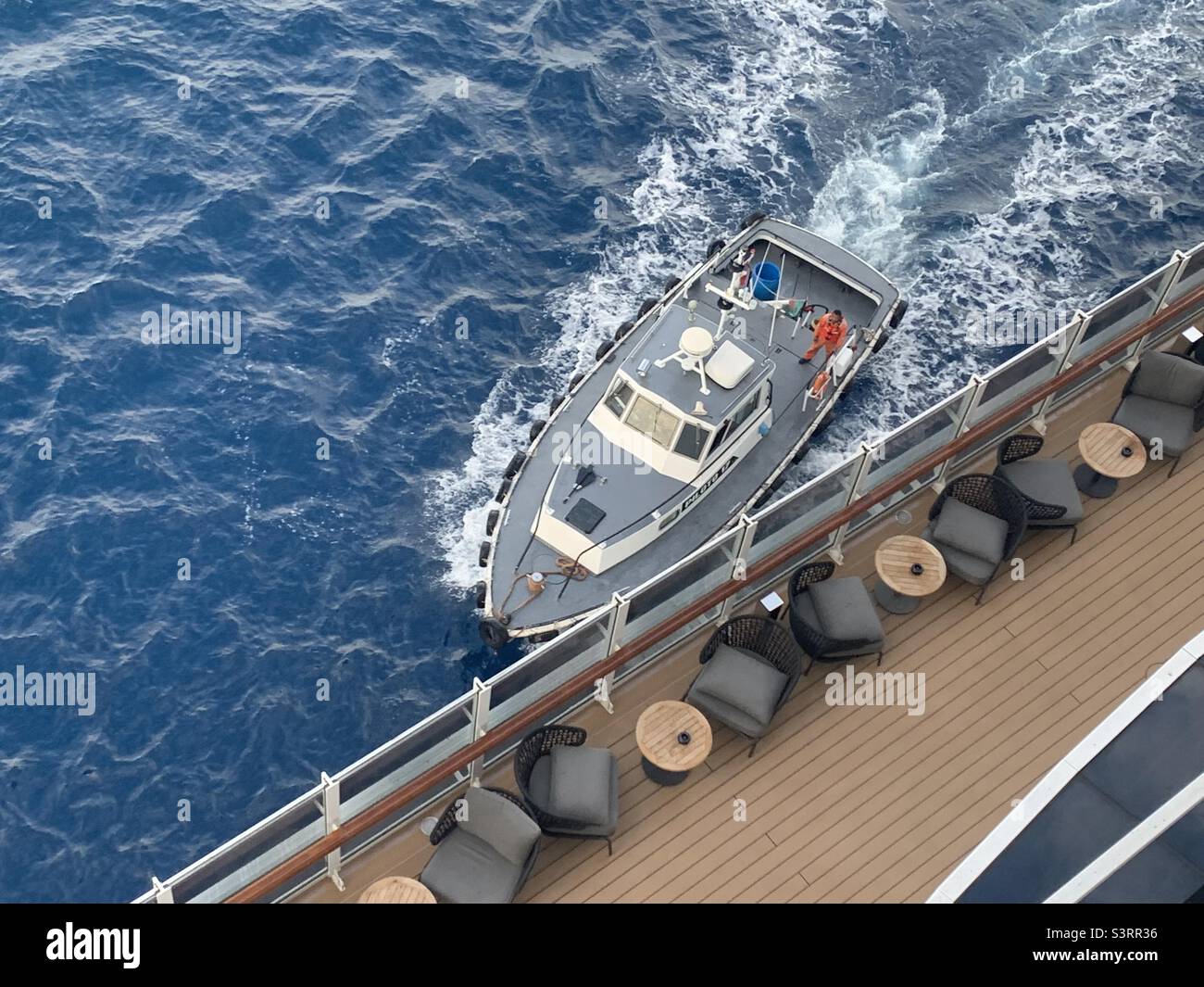 March, 2022, a pilot boat approaches the MSC Seashore near Puerto Playa ...