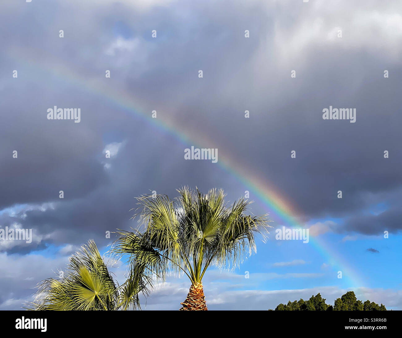 Rainbow and dark skyline hi-res stock photography and images - Alamy
