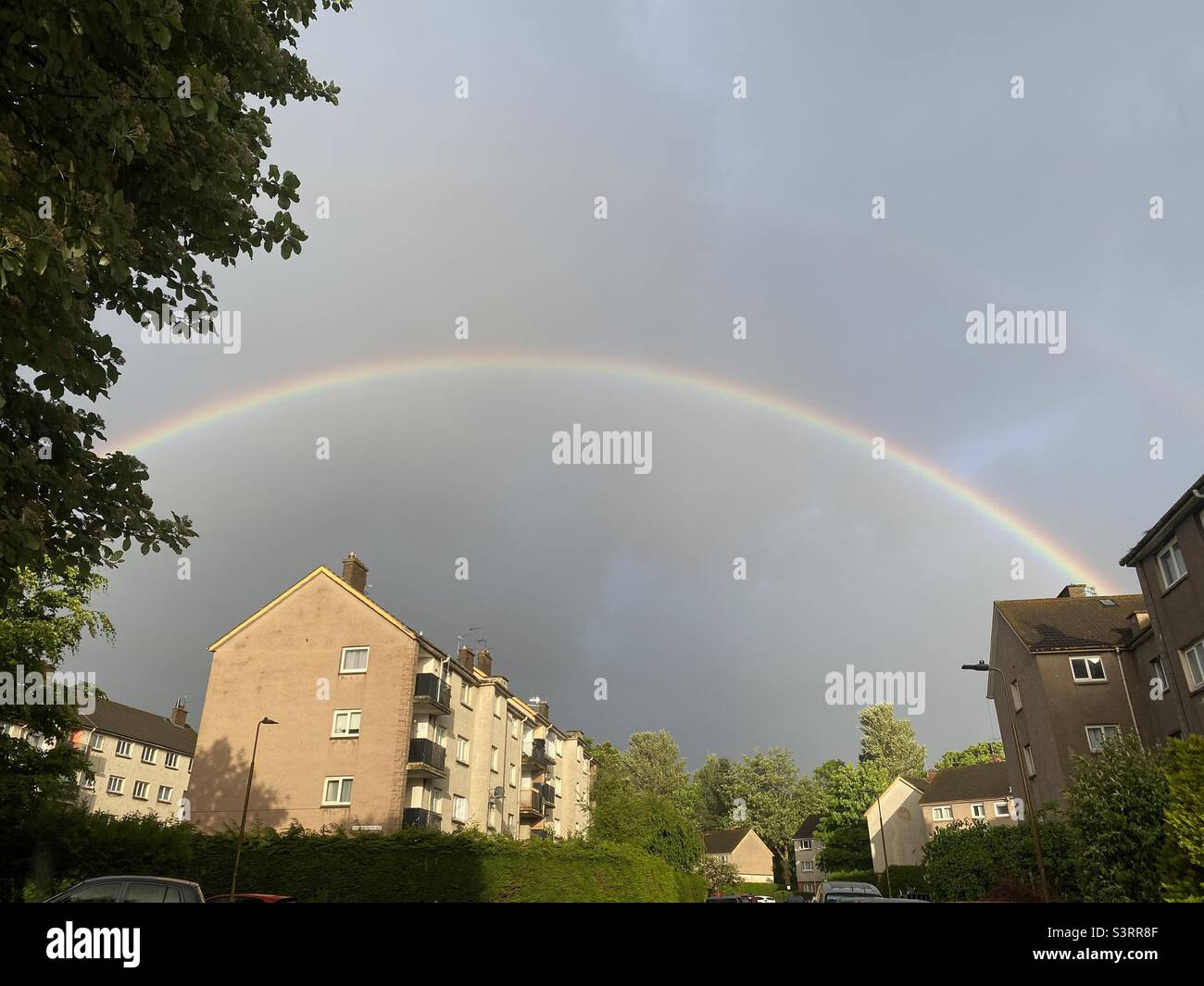 Rainbow raining hi-res stock photography and images - Alamy