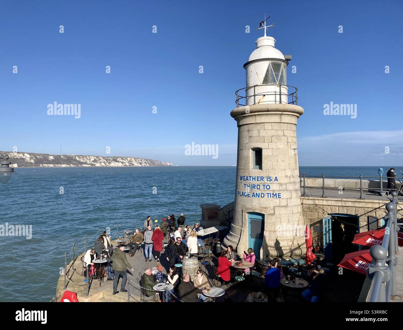 The lighthouse champagne bar on Folkestone pier Stock Photo - Alamy