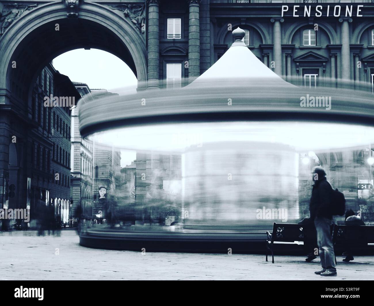 Florence, indipendenza square , lonely man standing watching moving ...