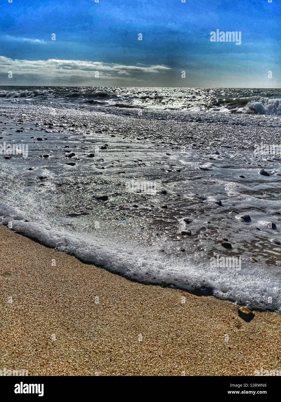Waves rolling on sand sea hi-res stock photography and images - Alamy
