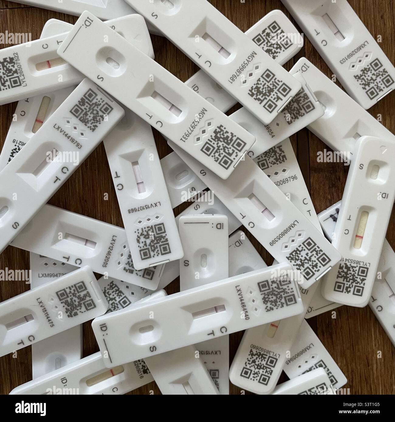 Pile of used COVID lateral flow tests Stock Photo - Alamy