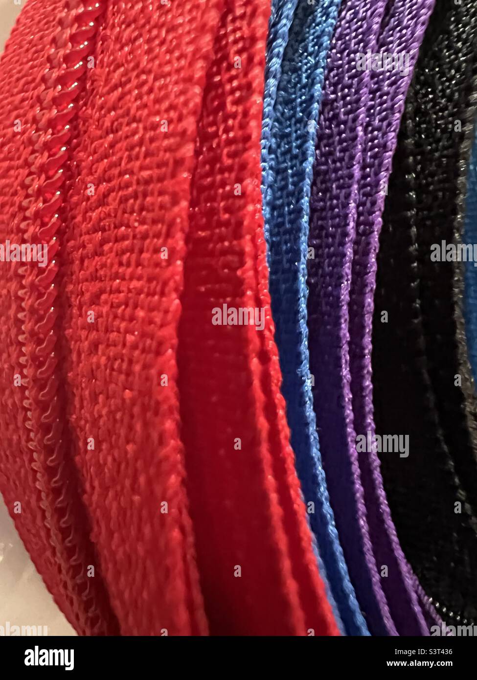 Colorful zipper collection closeup Stock Photo - Alamy
