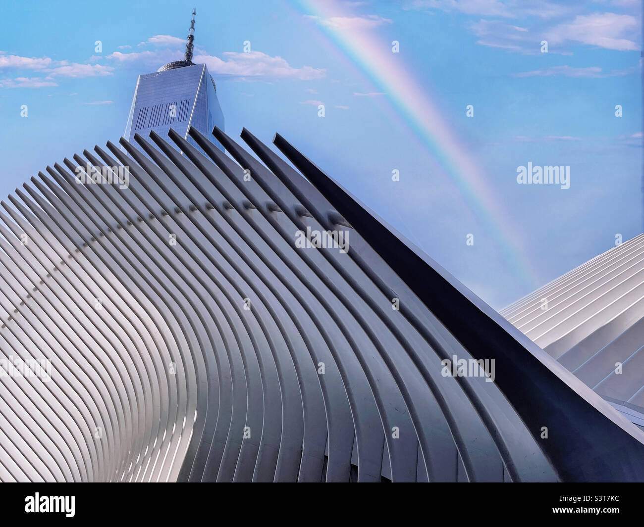 A bright and vibrant rainbow shines over one world trade in the oculus ...