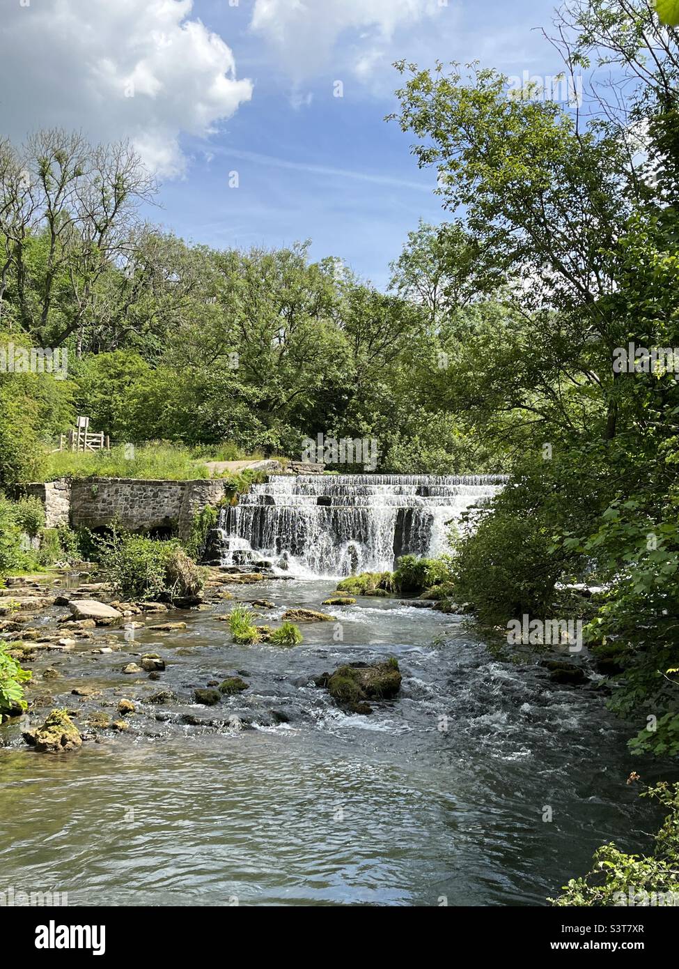 Weir on the River Wye in Monsal Dale, Peak District Stock Photo - Alamy