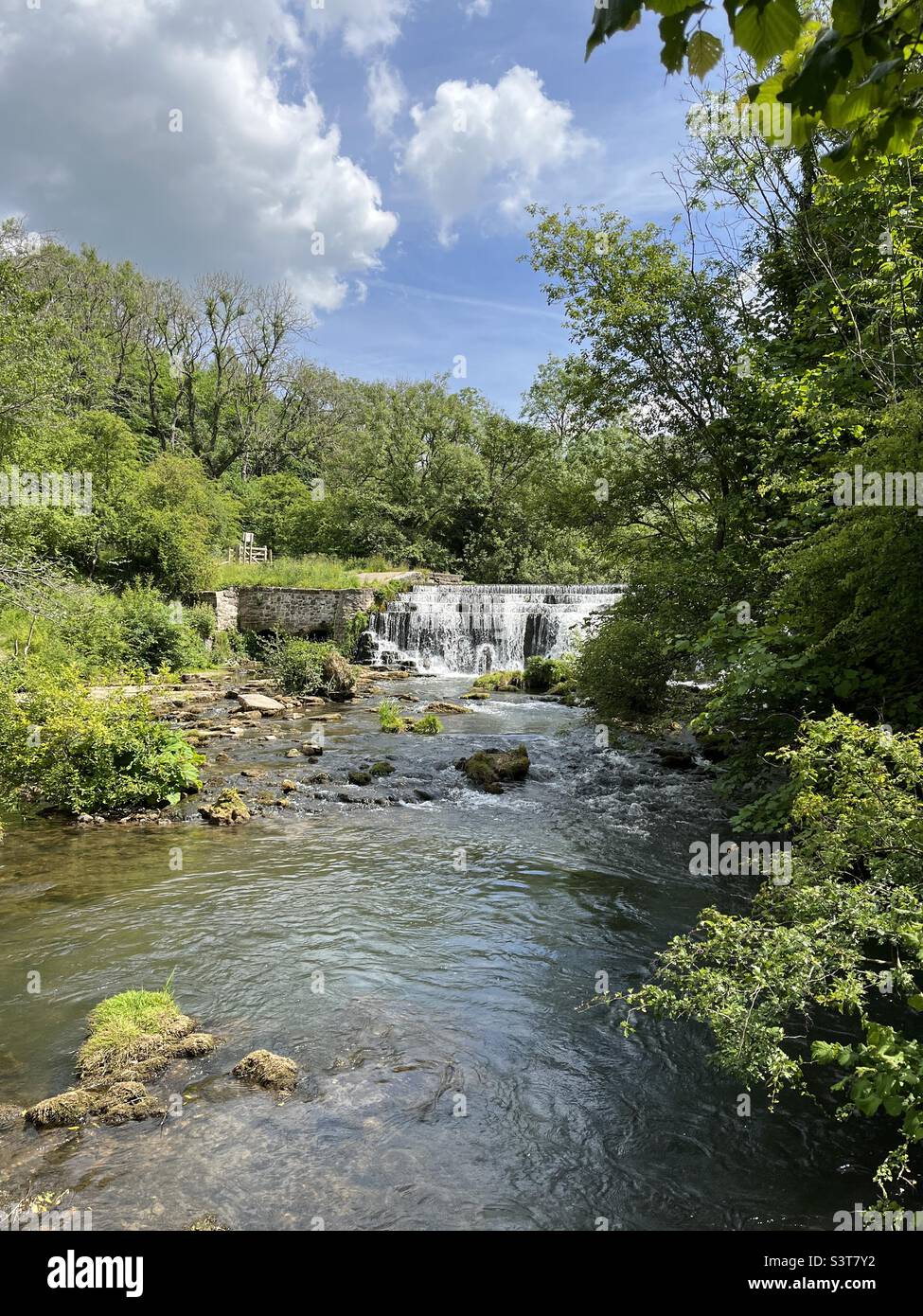 Weir on the River Wye in Monsal Dale, Peak District Stock Photo - Alamy
