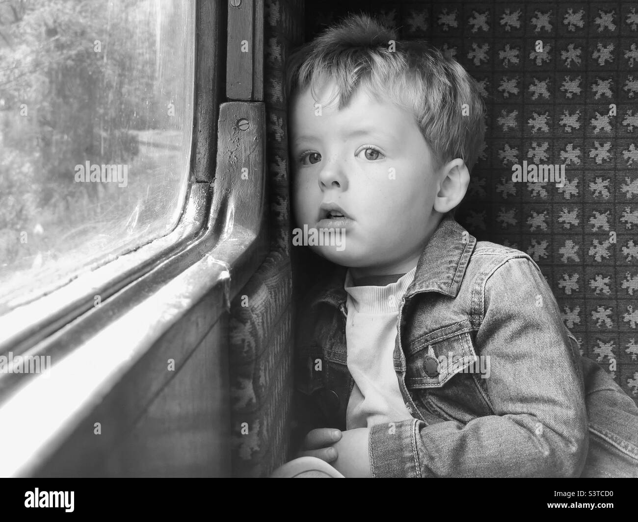 Little boy on a steam train Stock Photo - Alamy