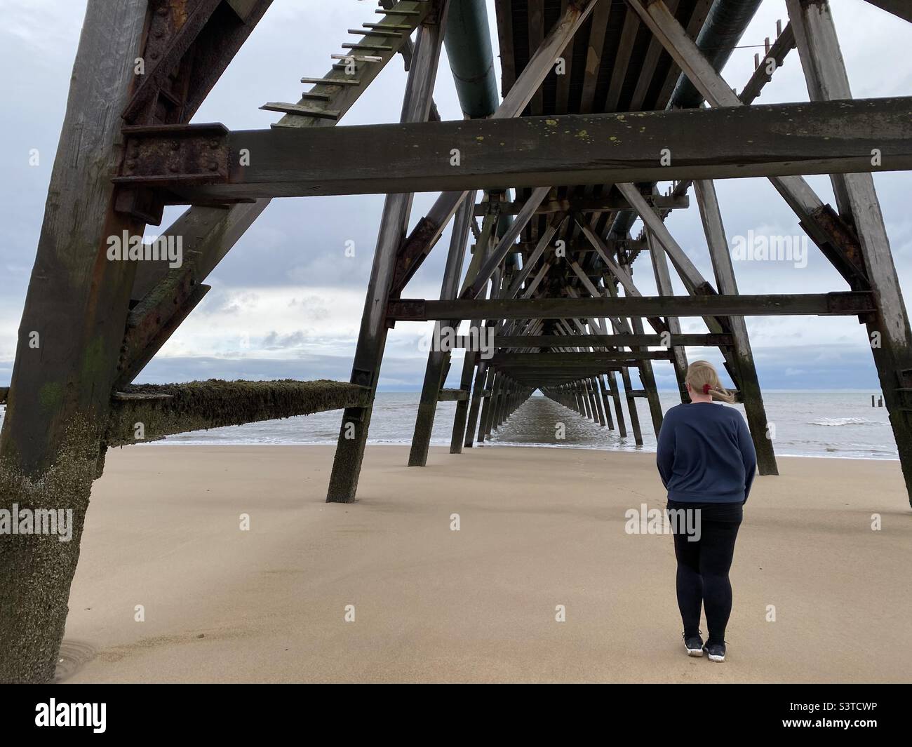 Woman walking underneath hi-res stock photography and images - Alamy