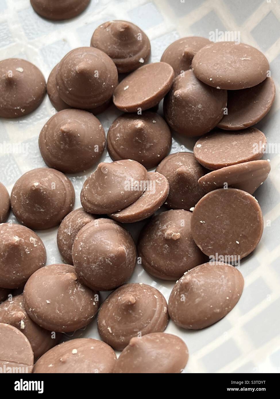 Organic Milk Chocolate Buttons Stock Photo - Alamy