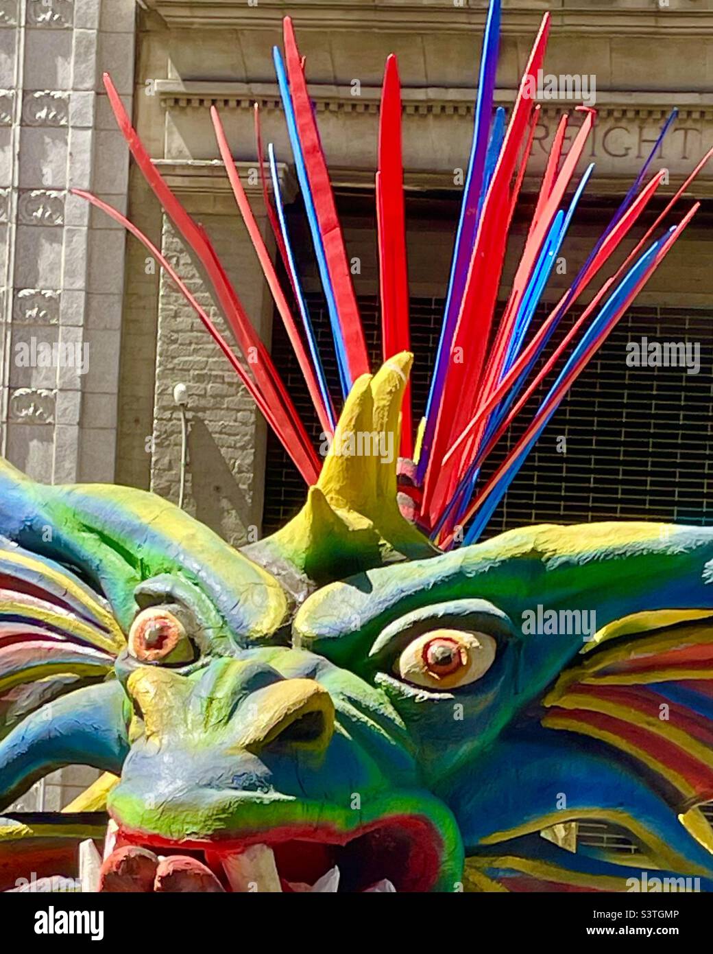A colorful dragon face on a parade float for pride parade NY 2022 Stock ...