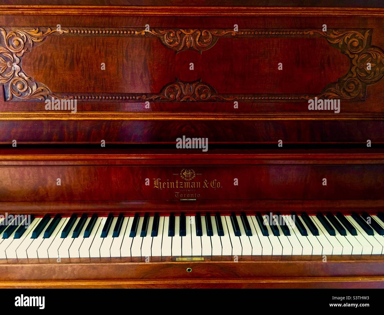 Antique piano, closeup of the keyboard and housing, Canada Stock Photo ...