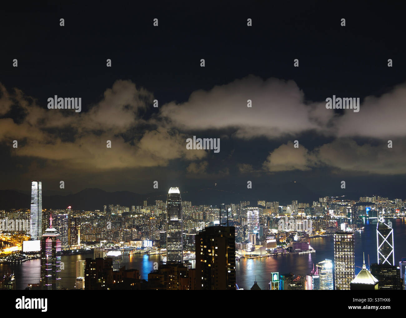 Clouds above Hong Kong skyline Stock Photo - Alamy