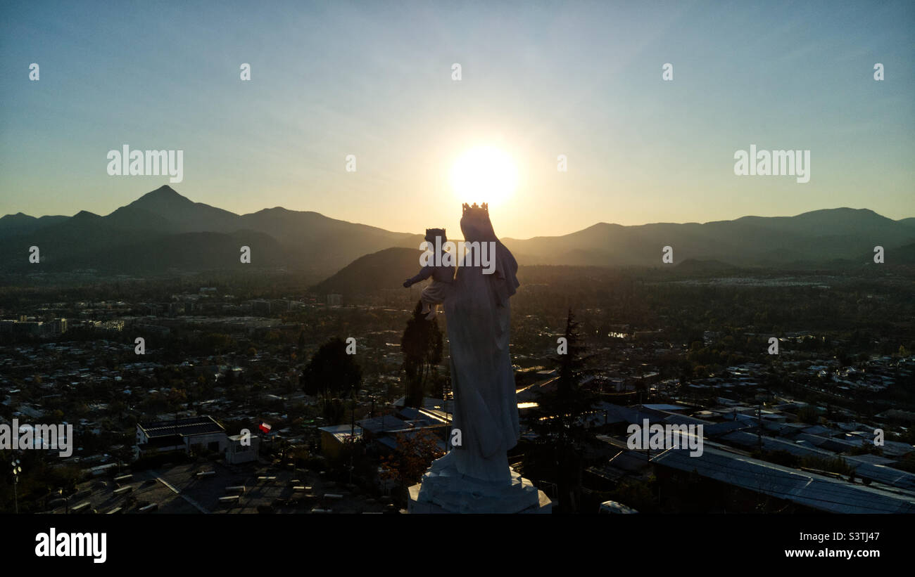 Sunset with Virgin Mary Stock Photo - Alamy