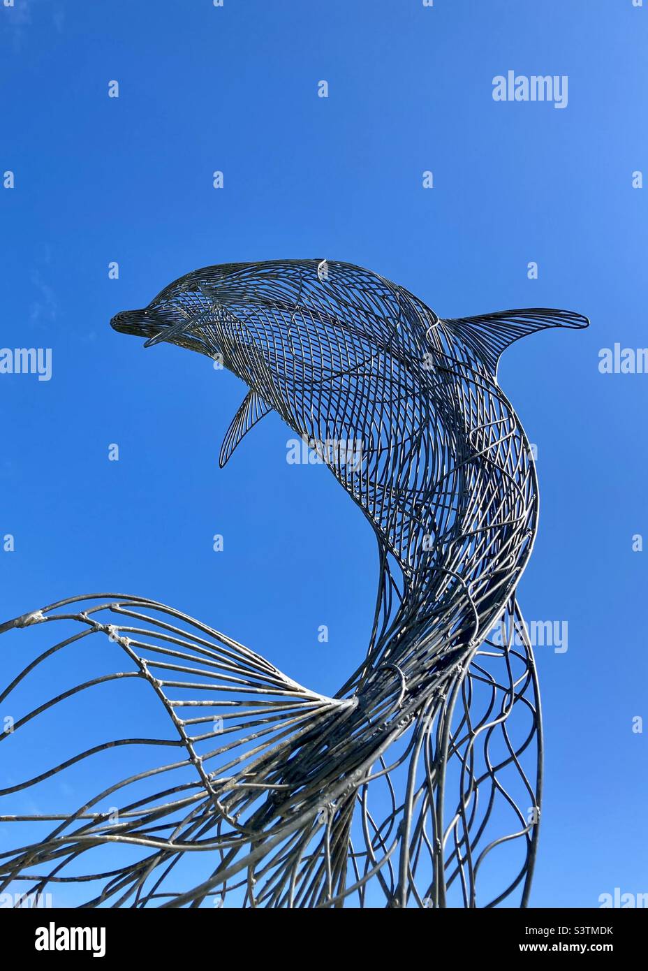 Portsoy Harbour Dolphin Sculpture, Scotland Stock Photo - Alamy