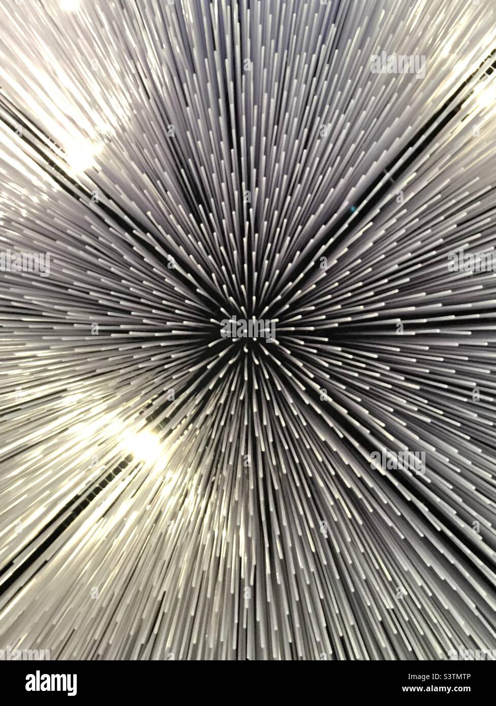 abstract hanging ceiling. ceiling consisting of many white rods, bottom ...