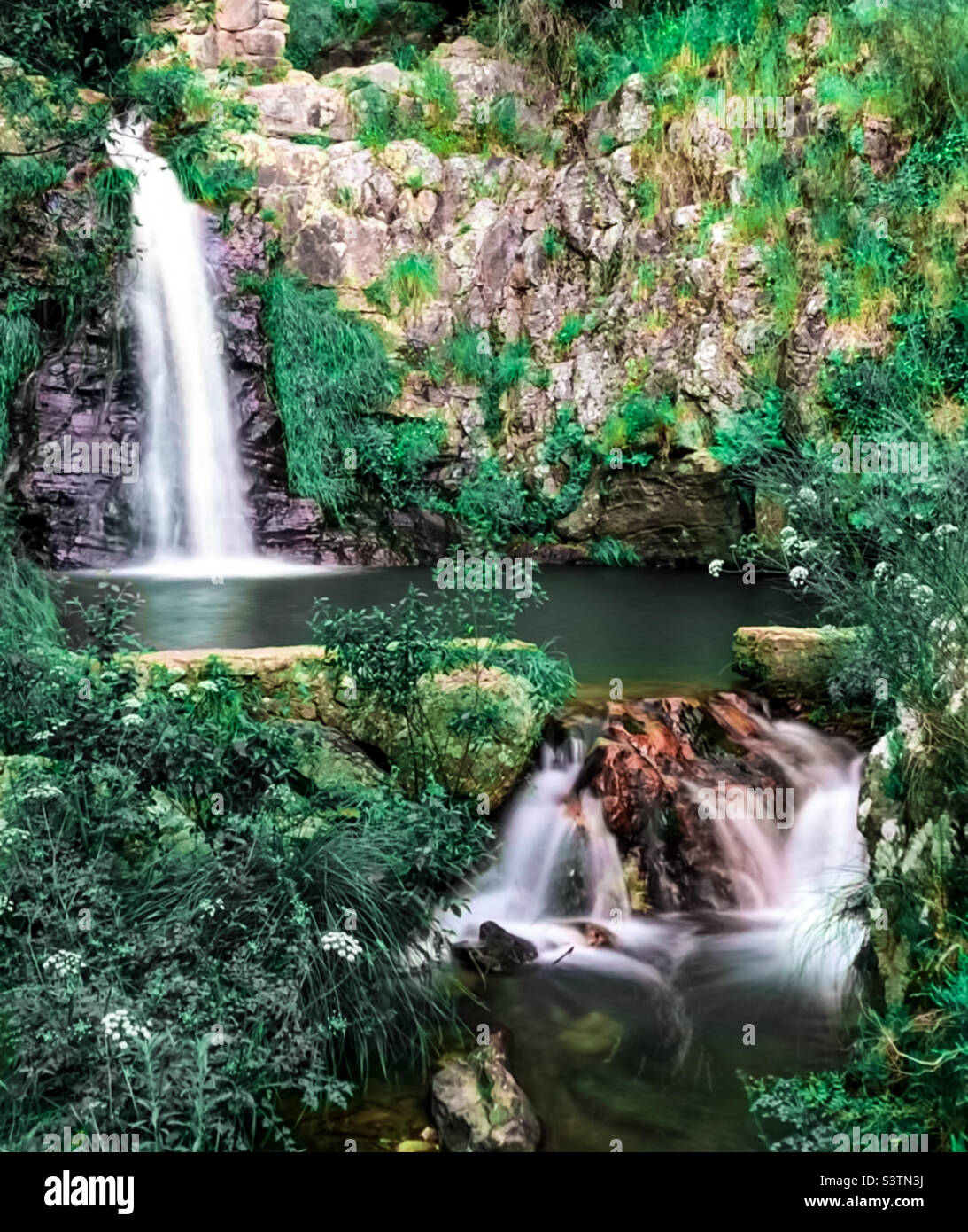 Waterfalls at Cascata do Penedo Furado, Central Portugal Stock Photo ...