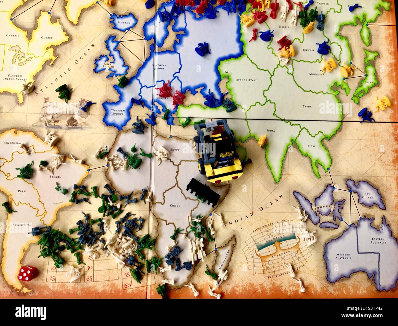 War game. The board is laid out, with troops, tanks, and other ...