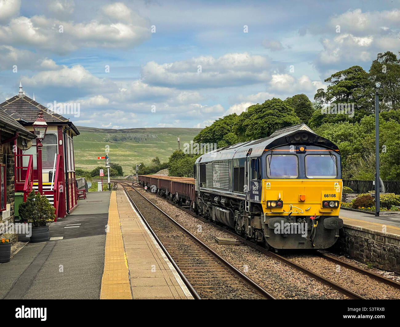 Goods Train passing Southbound through Garsdale Station, Yorkshire ...