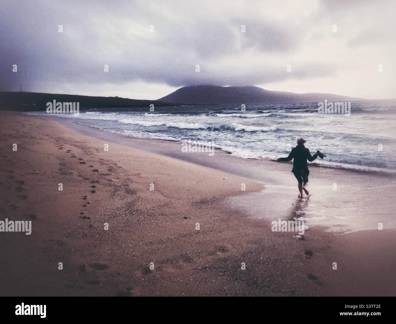 Happy woman running on beach hi-res stock photography and images - Alamy