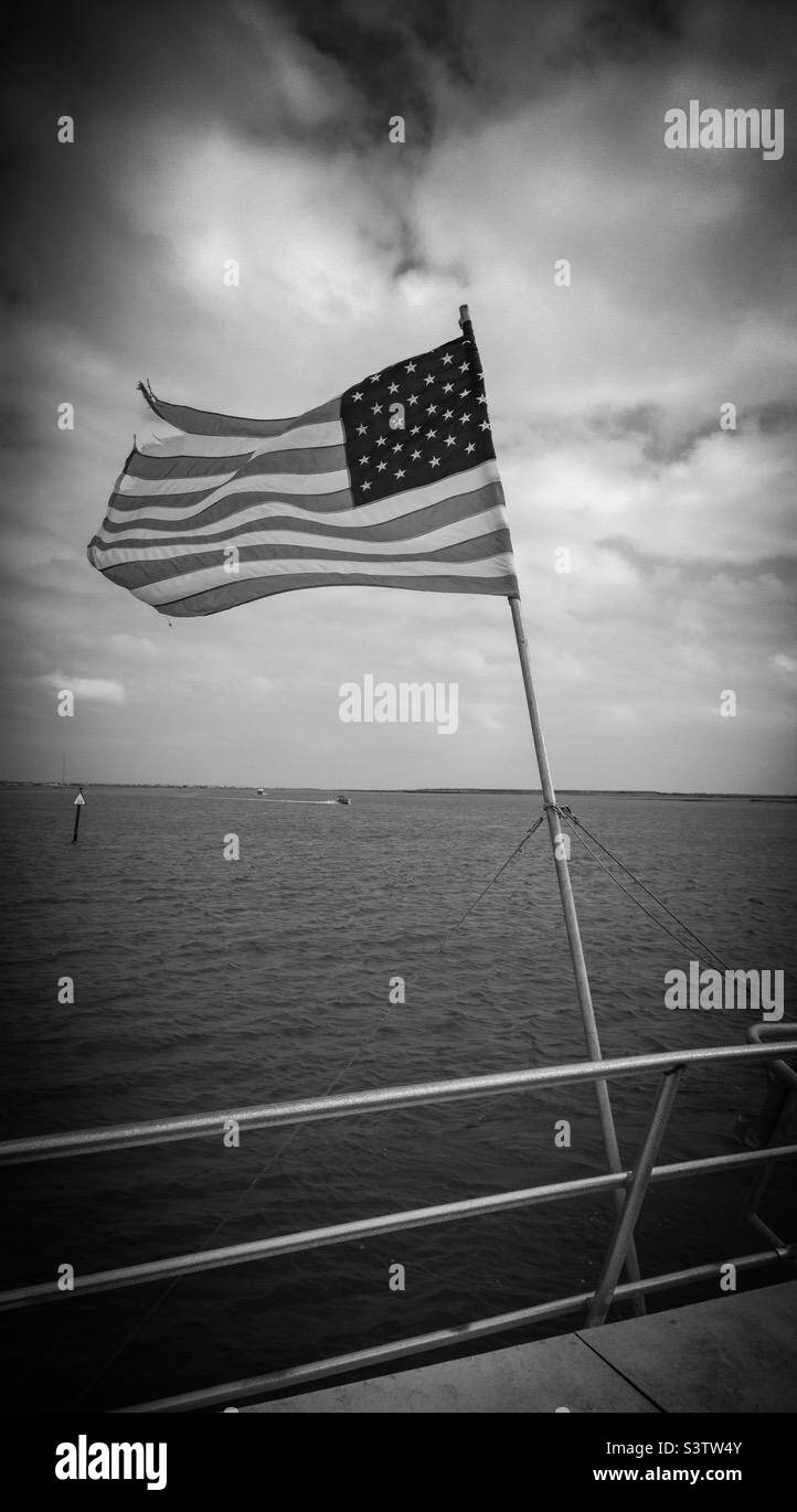 American flag back of boat hi-res stock photography and images - Alamy