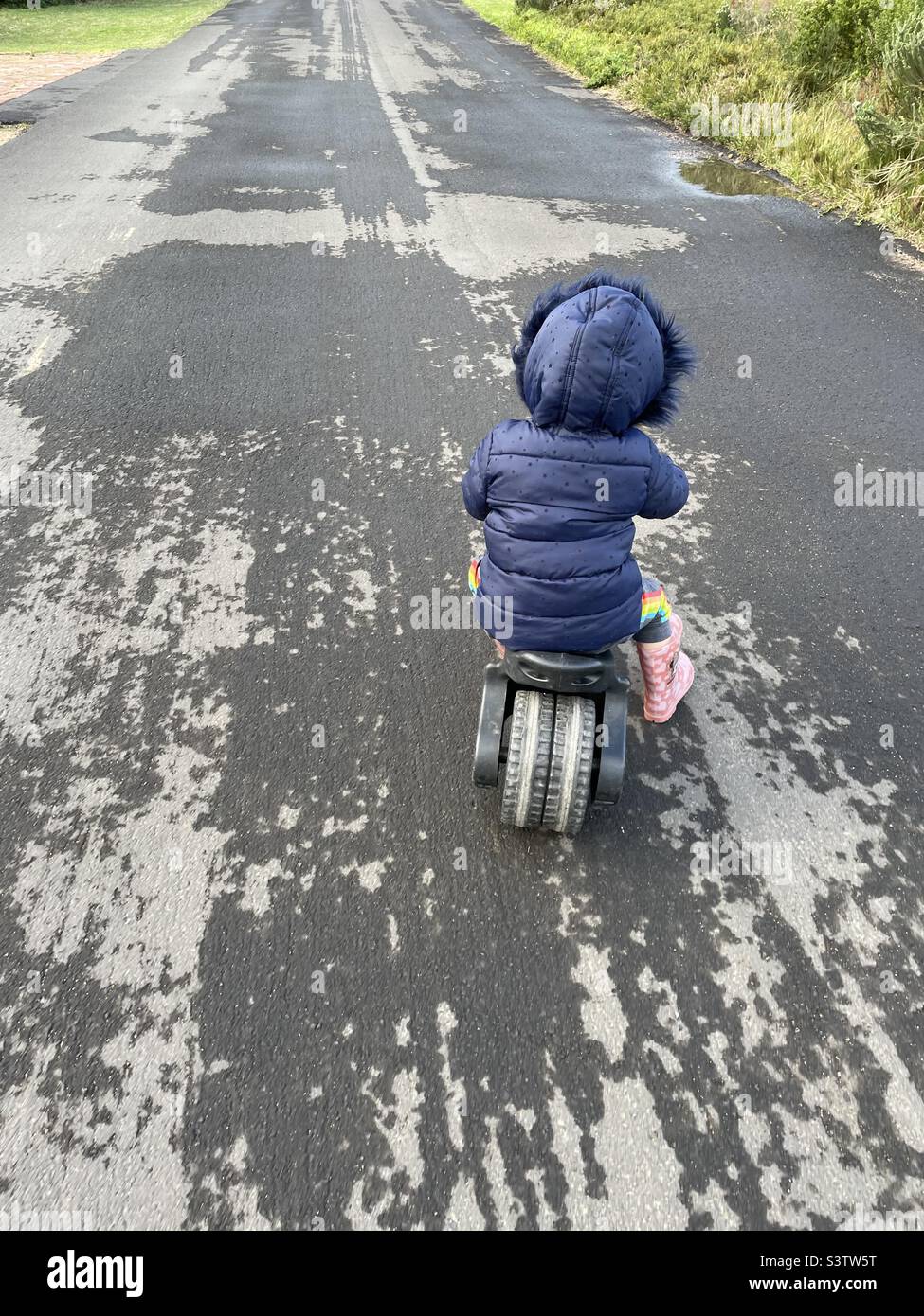 Winter rainy day scooter ride Stock Photo - Alamy