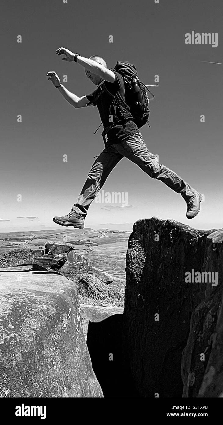 Jumping while walking Black and White Stock Photos & Images - Alamy