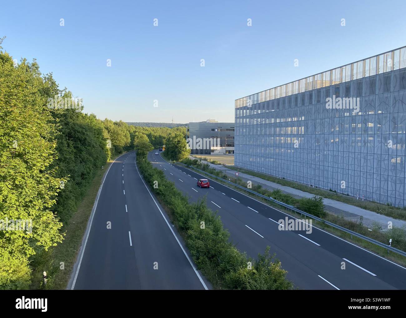 Long German Street Roads, Lively Trees And Parking Deck Car Park ...