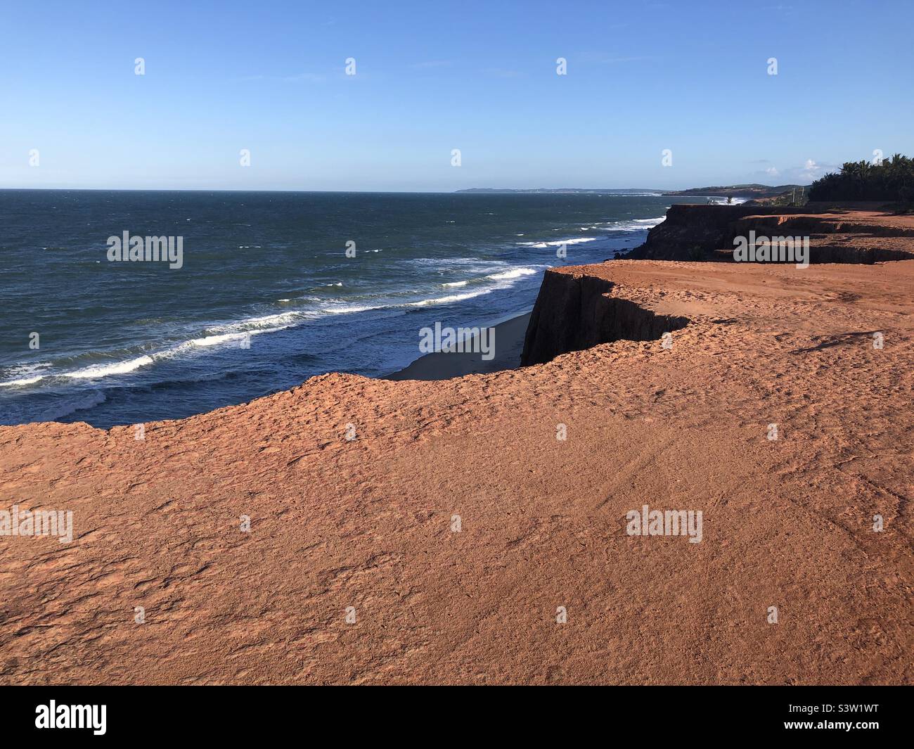 View of the sea from the red cliffs in Pipa, Brazil Stock Photo - Alamy