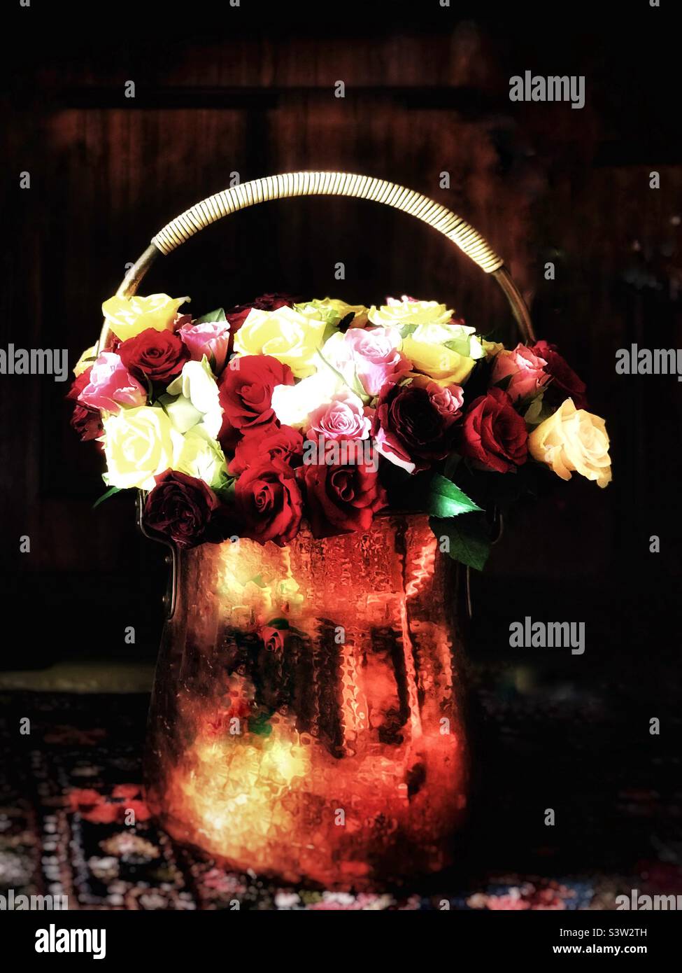 Bucket of Roses Stock Photo - Alamy