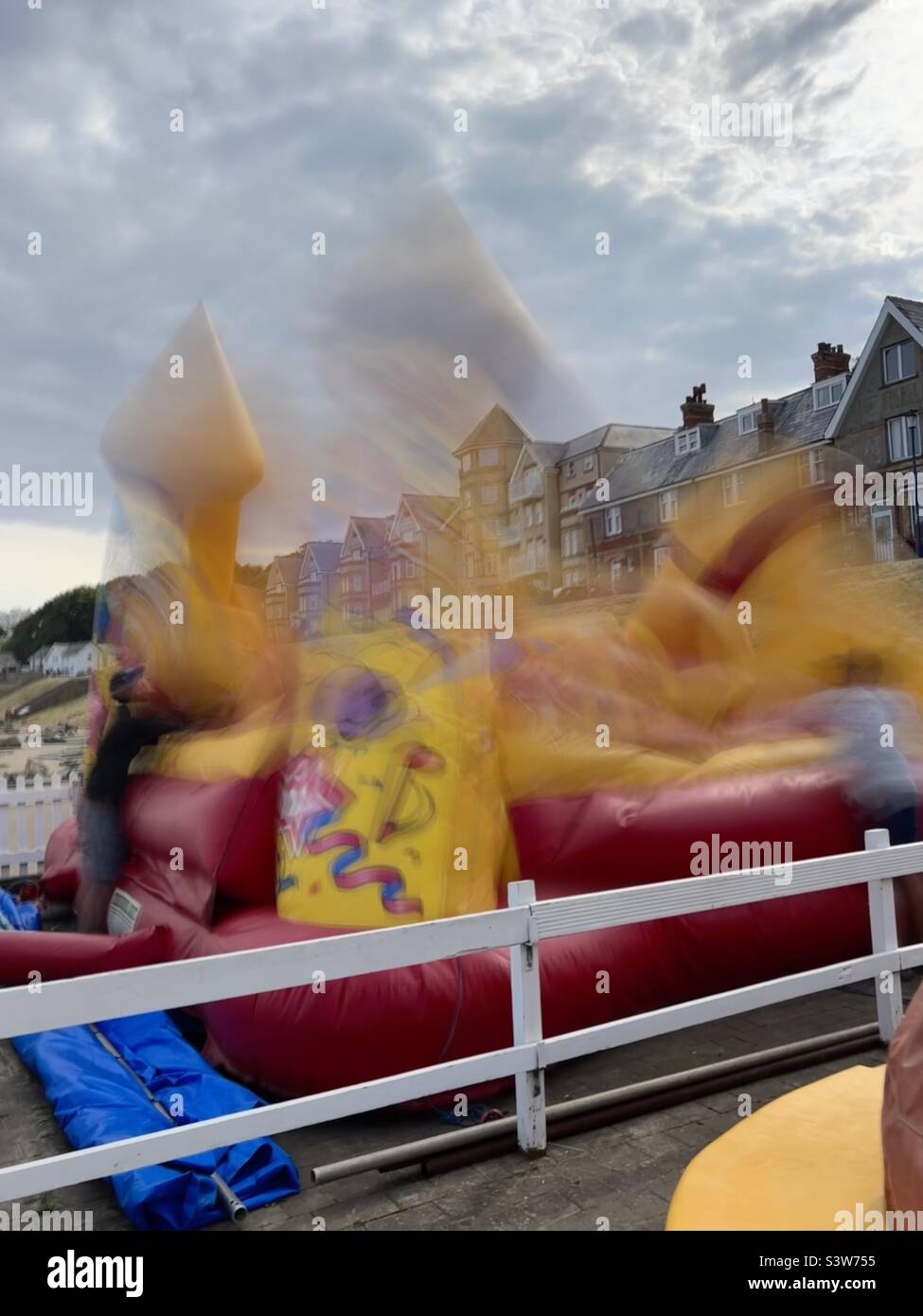 Long exposure of bouncy castle being deflated Stock Photo - Alamy