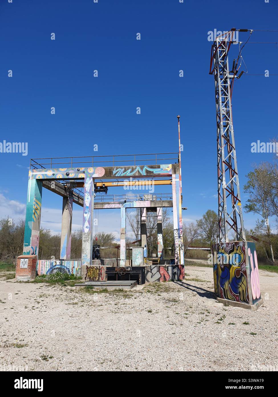Abandoned graffiti covered structure Stock Photo - Alamy