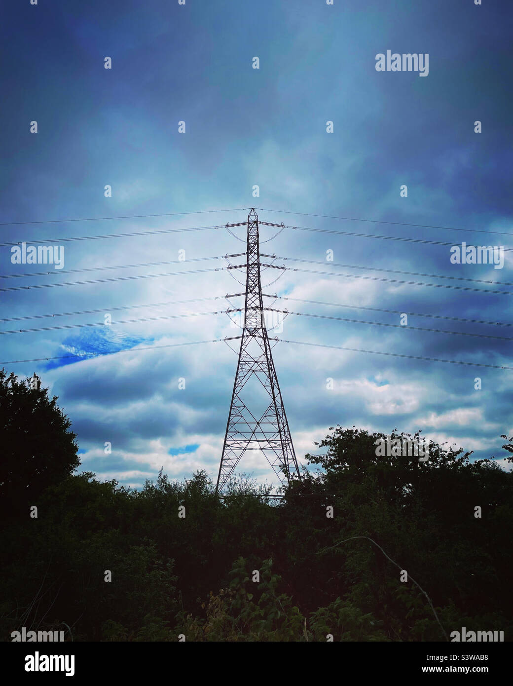 Pylon and cloudy sky Stock Photo - Alamy