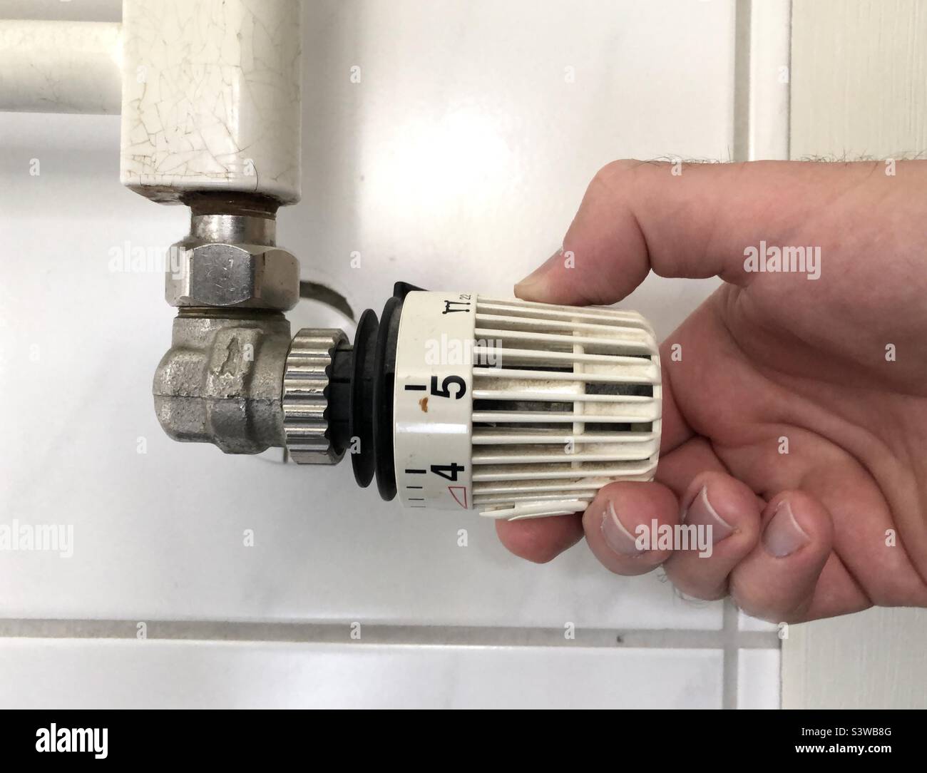 Turn down heating hi-res stock photography and images - Alamy