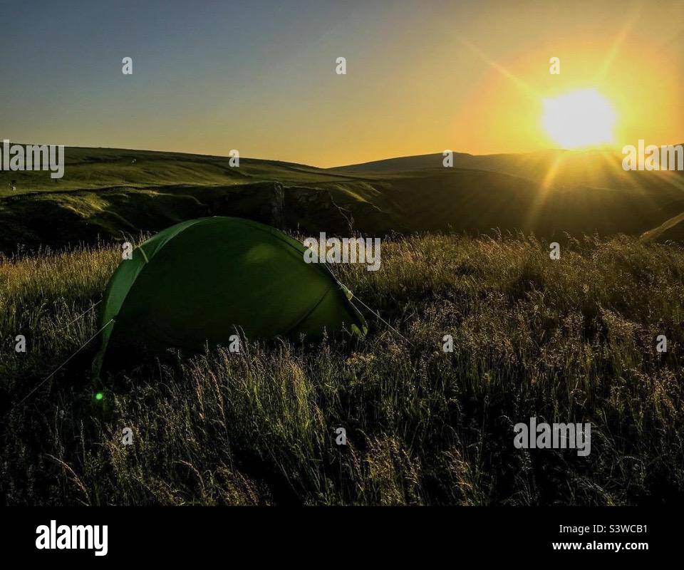 Wild camping sunset Stock Photo - Alamy