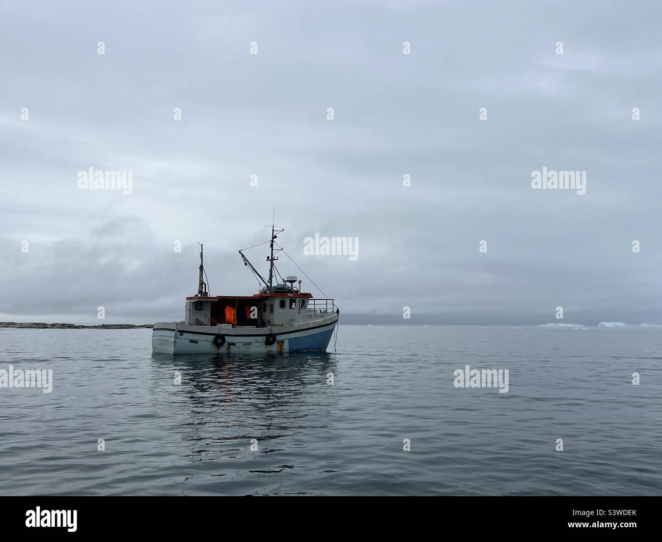 Fishing boat in Ilimanaq, Disko Bay, Greenland Stock Photo - Alamy