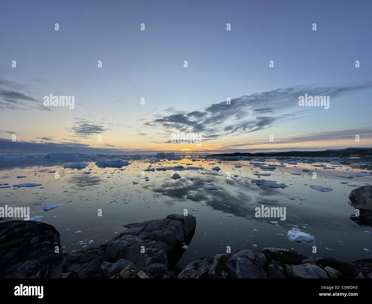 Midnight sun, Greenland Stock Photo - Alamy