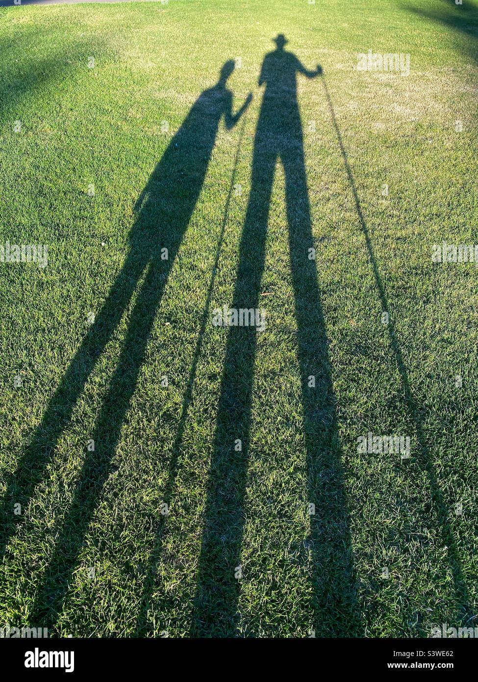 Tall shadows people hi-res stock photography and images - Alamy