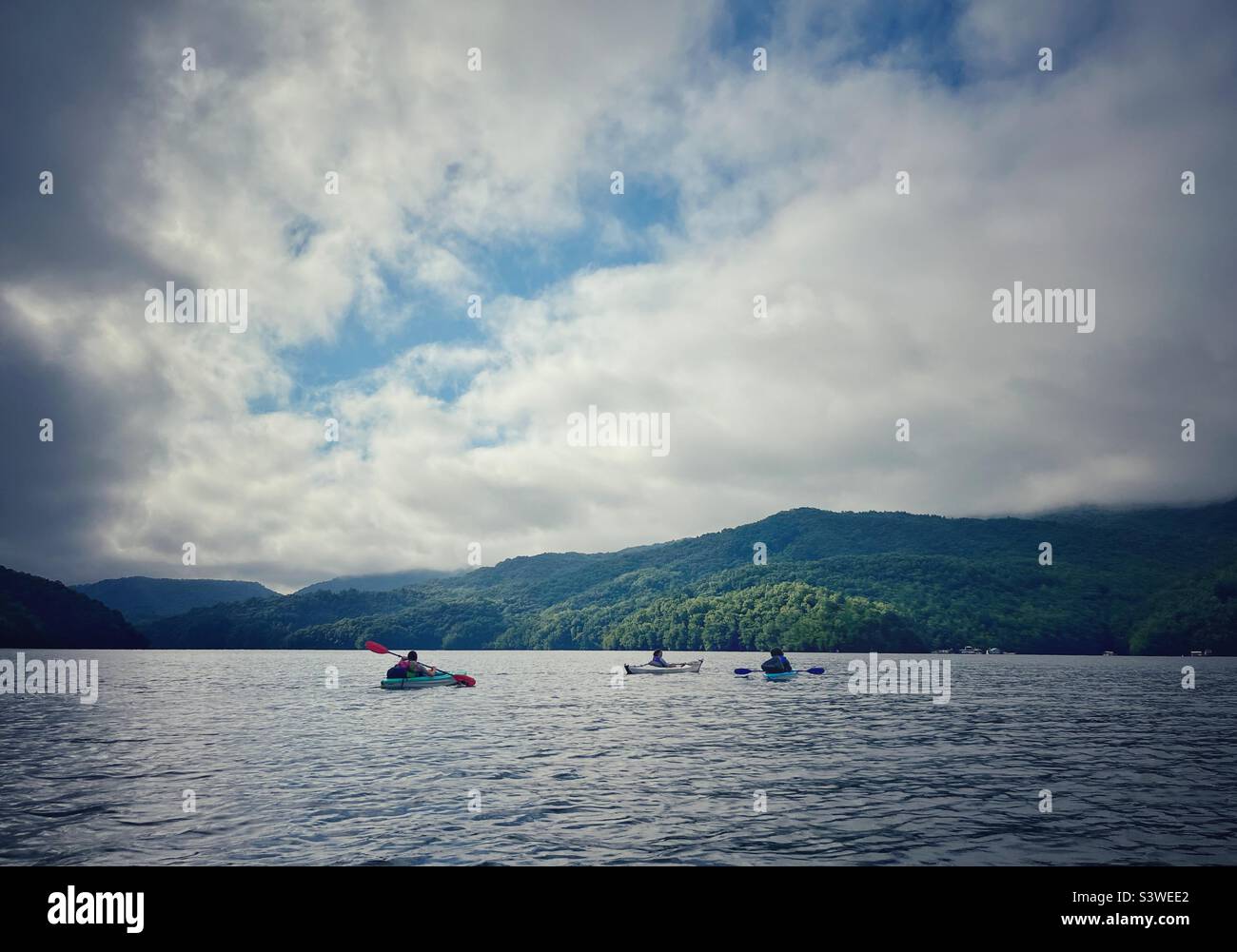 Kayakers paddling in Lake Fontana in Western North Carolina Stock Photo ... Kayakers paddling in Lake Fontana in Western North Carolina Stock Photo ...