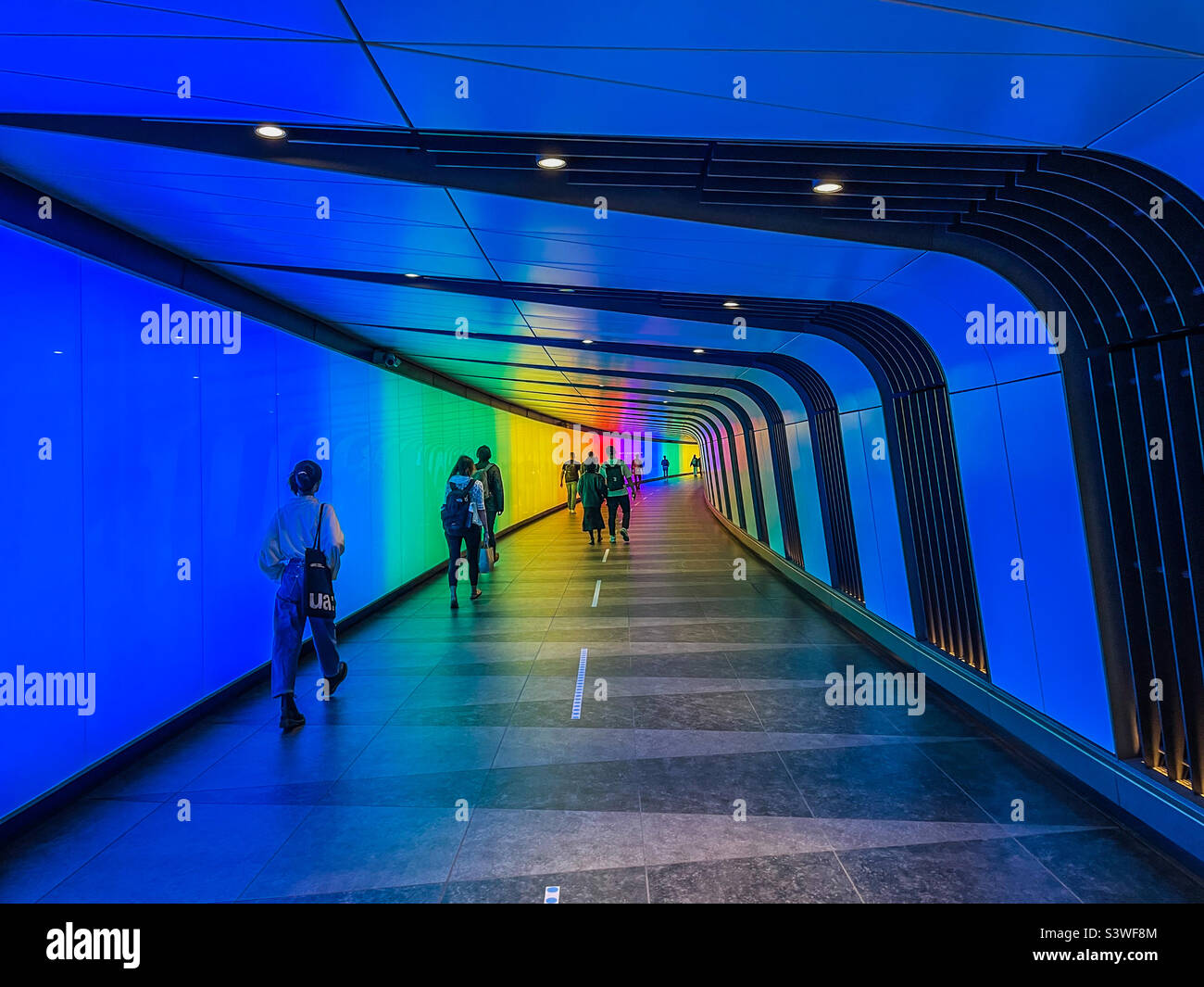 Kings Cross underground rainbow walkway Stock Photo - Alamy