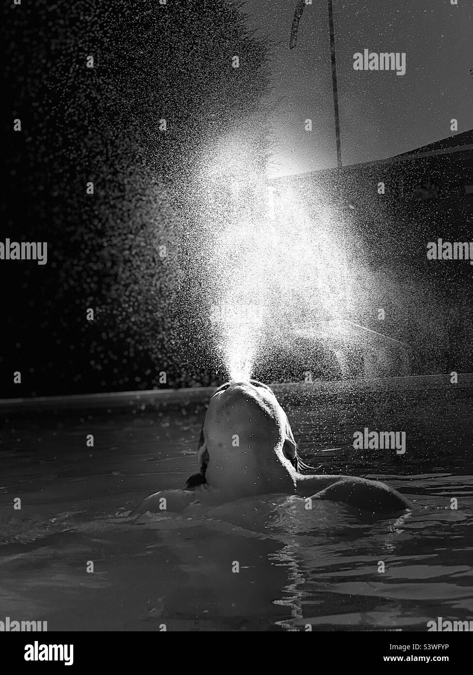 Man diving into pool hi-res stock photography and images - Alamy