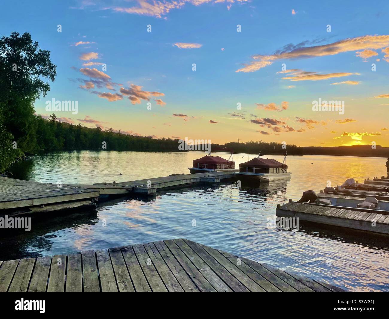 Sunset over Gunflint lake Stock Photo - Alamy