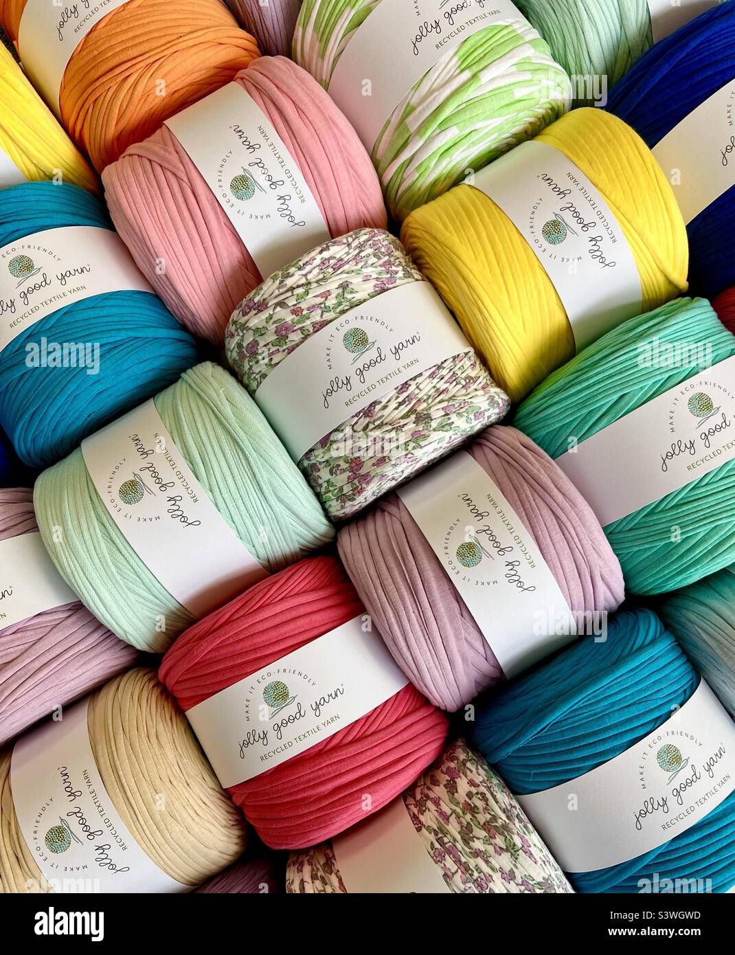 Collection of yarn bobbins made from recycled t-shirts Stock Photo - Alamy